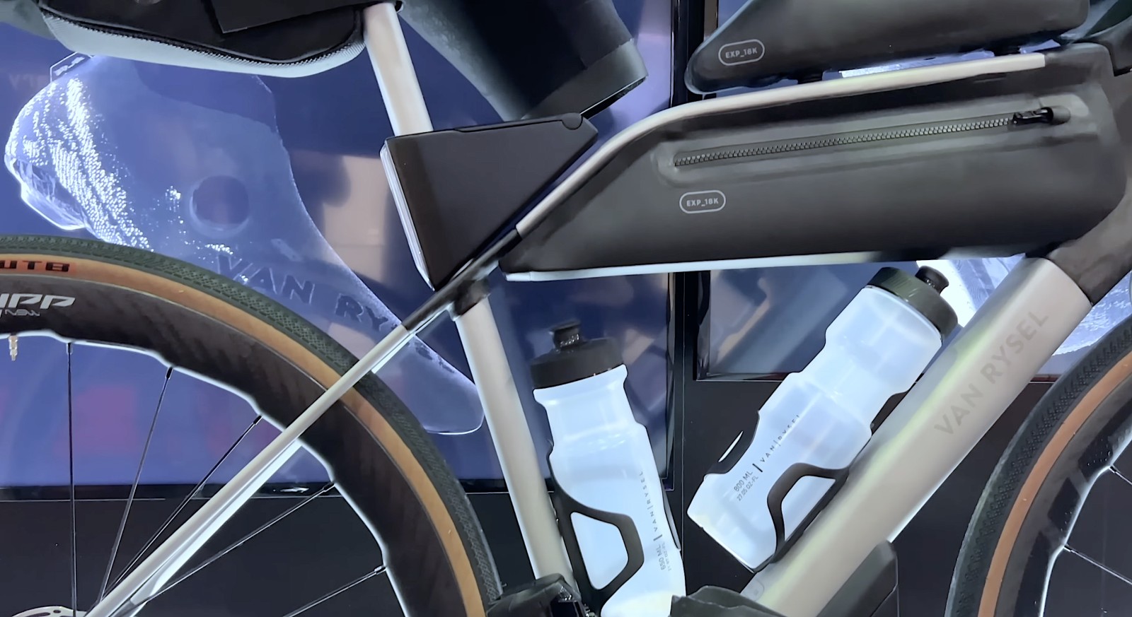 A Van Rysel with a titanium frame, carbon inserts and integrated bags ...
