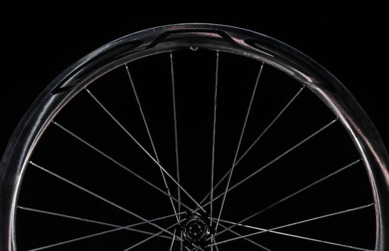 These wheels have titanium and carbon spokes and only weigh 795g per pair